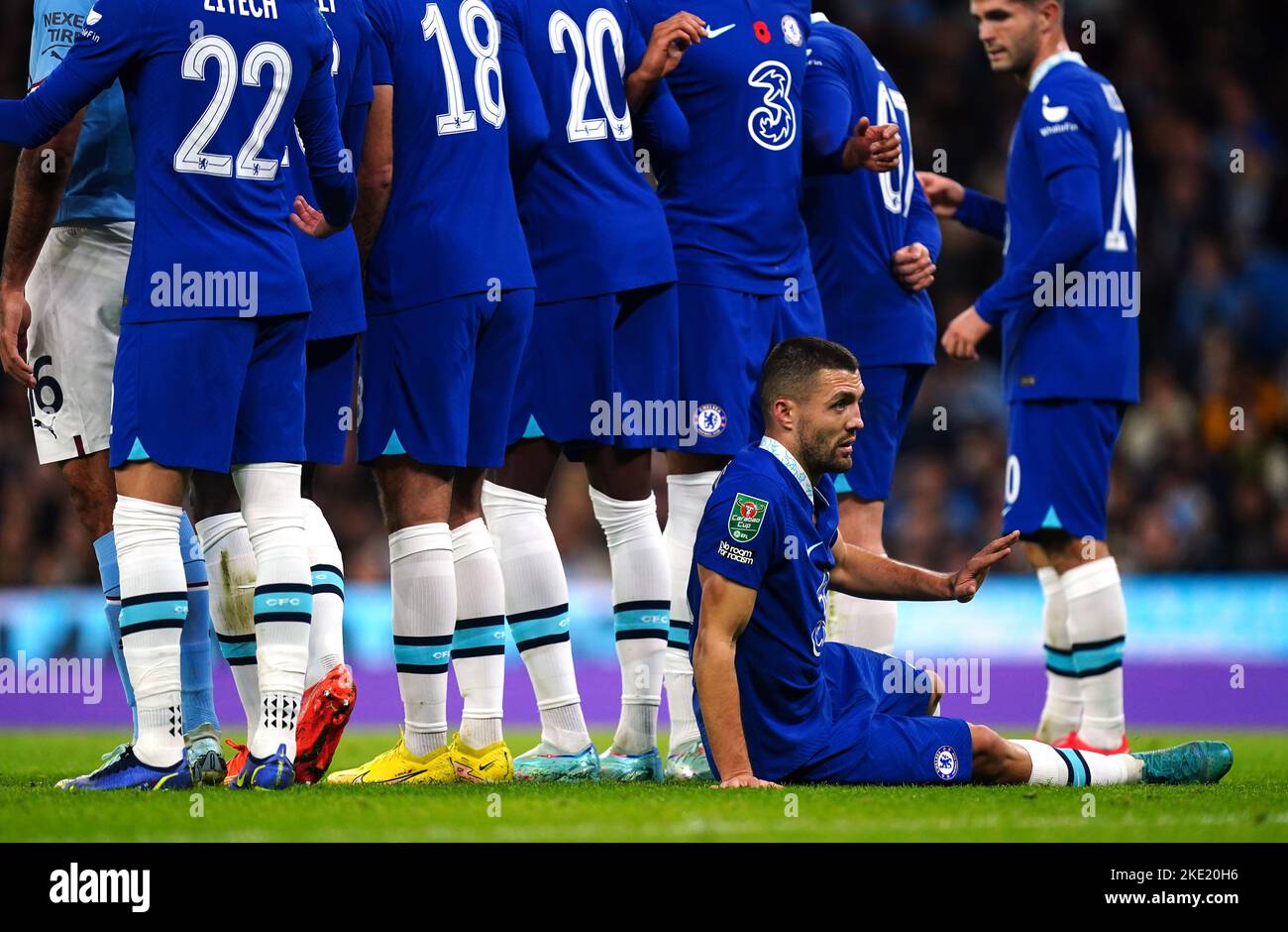 Chelsea's Mateo Kovacic lies at the feet of a defensive wall for a free ...