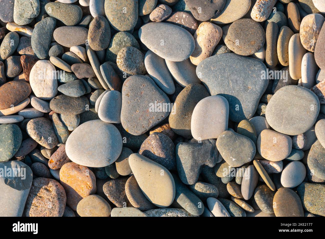 Rounded grey granite rocks beach hi-res stock photography and images ...