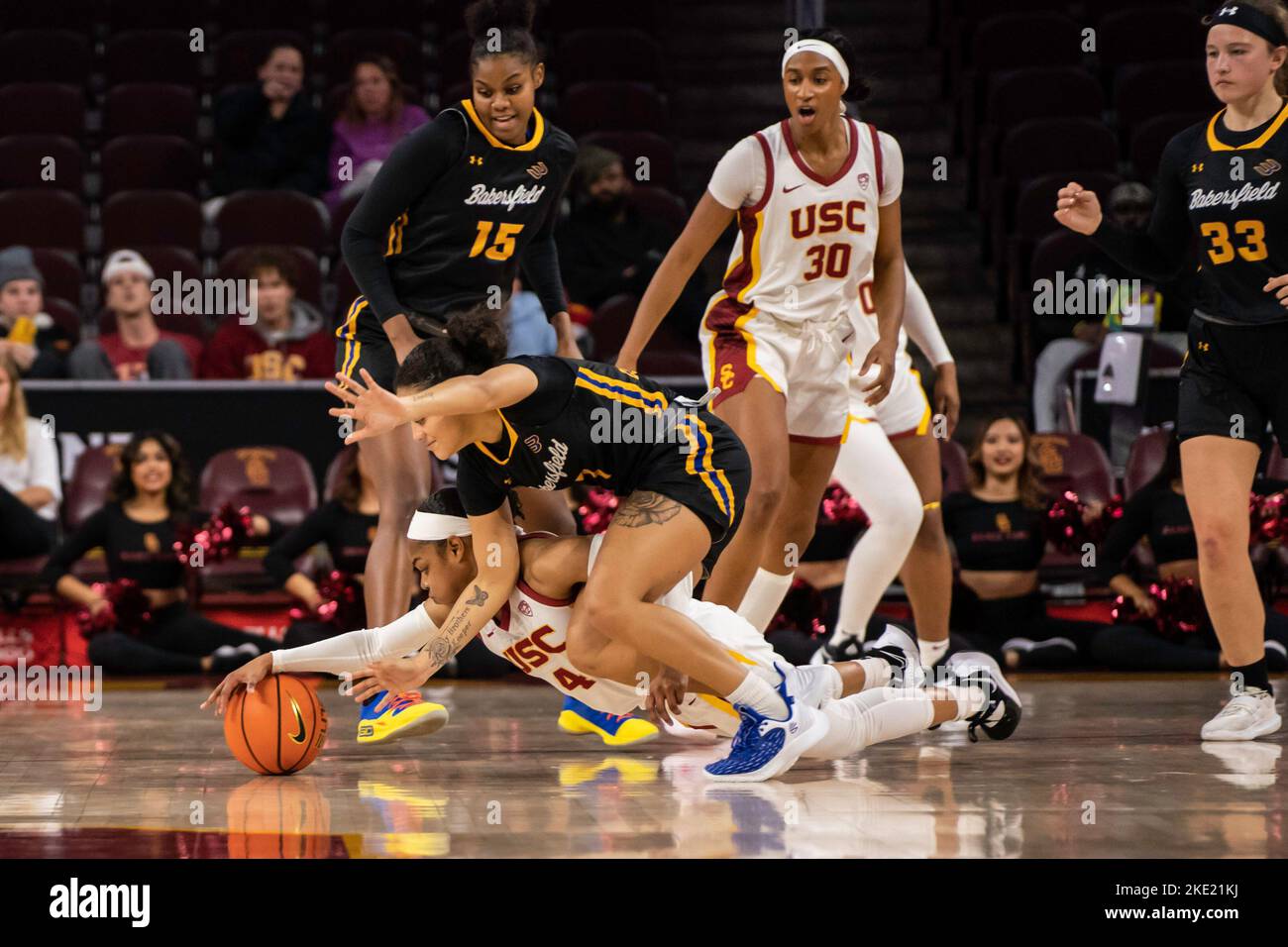 USC Trojans guard Kayla Williams (4) battles for possession with CSU ...
