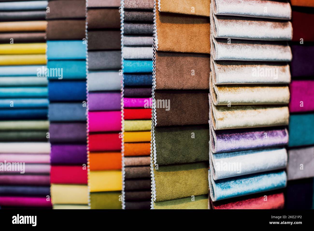 Many different colorful and bright fabric samples for upholstered ...