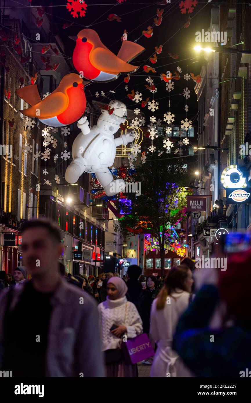 London, UK. 9 November 2022. Christmas lights in Carnaby Street which ...