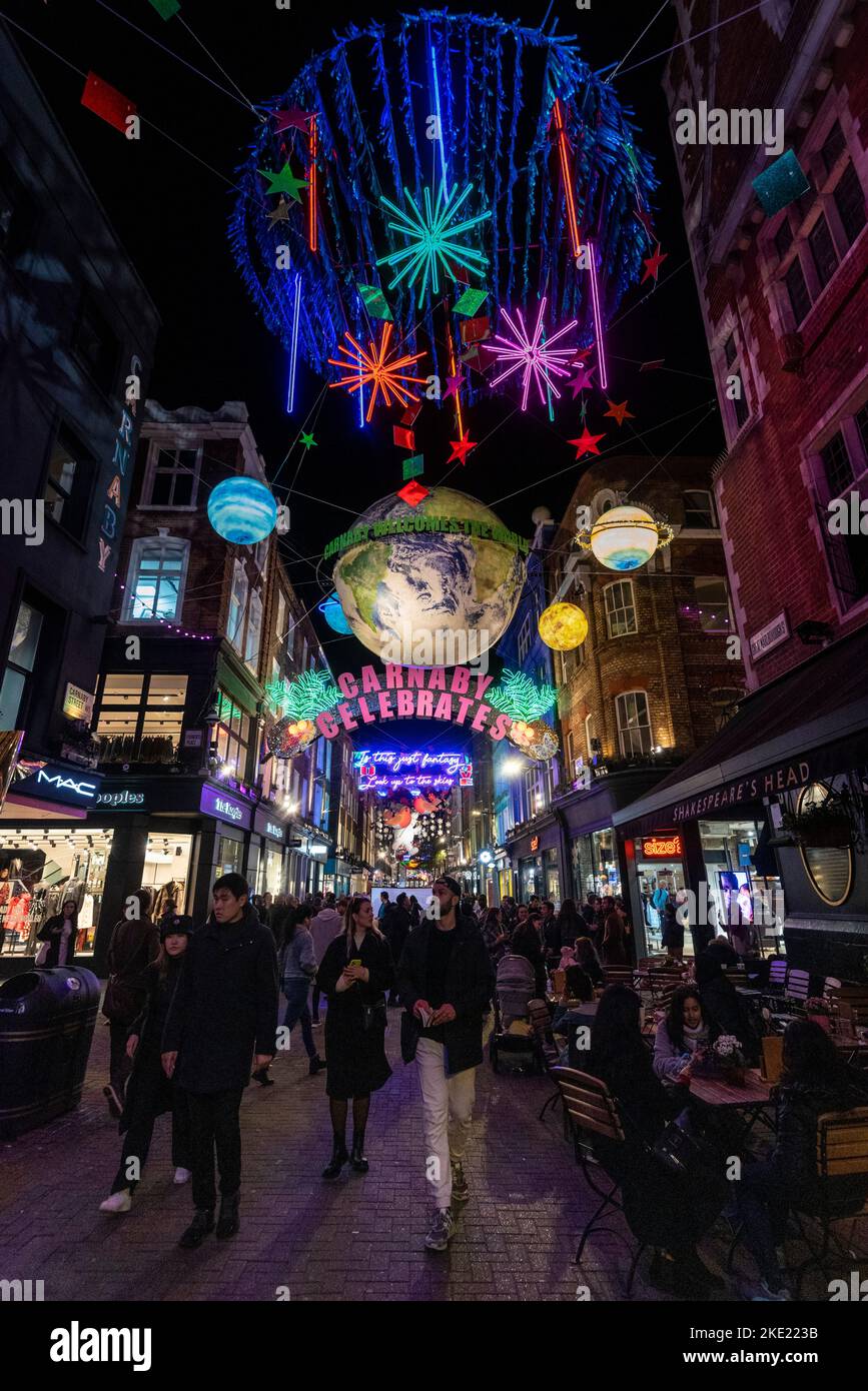 London, UK. 9 November 2022. Christmas lights in Carnaby Street which ...