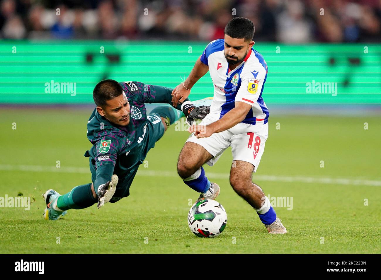 Blackburn Rovers' Dilan Markanday (right) and West Ham's Alphonse ...