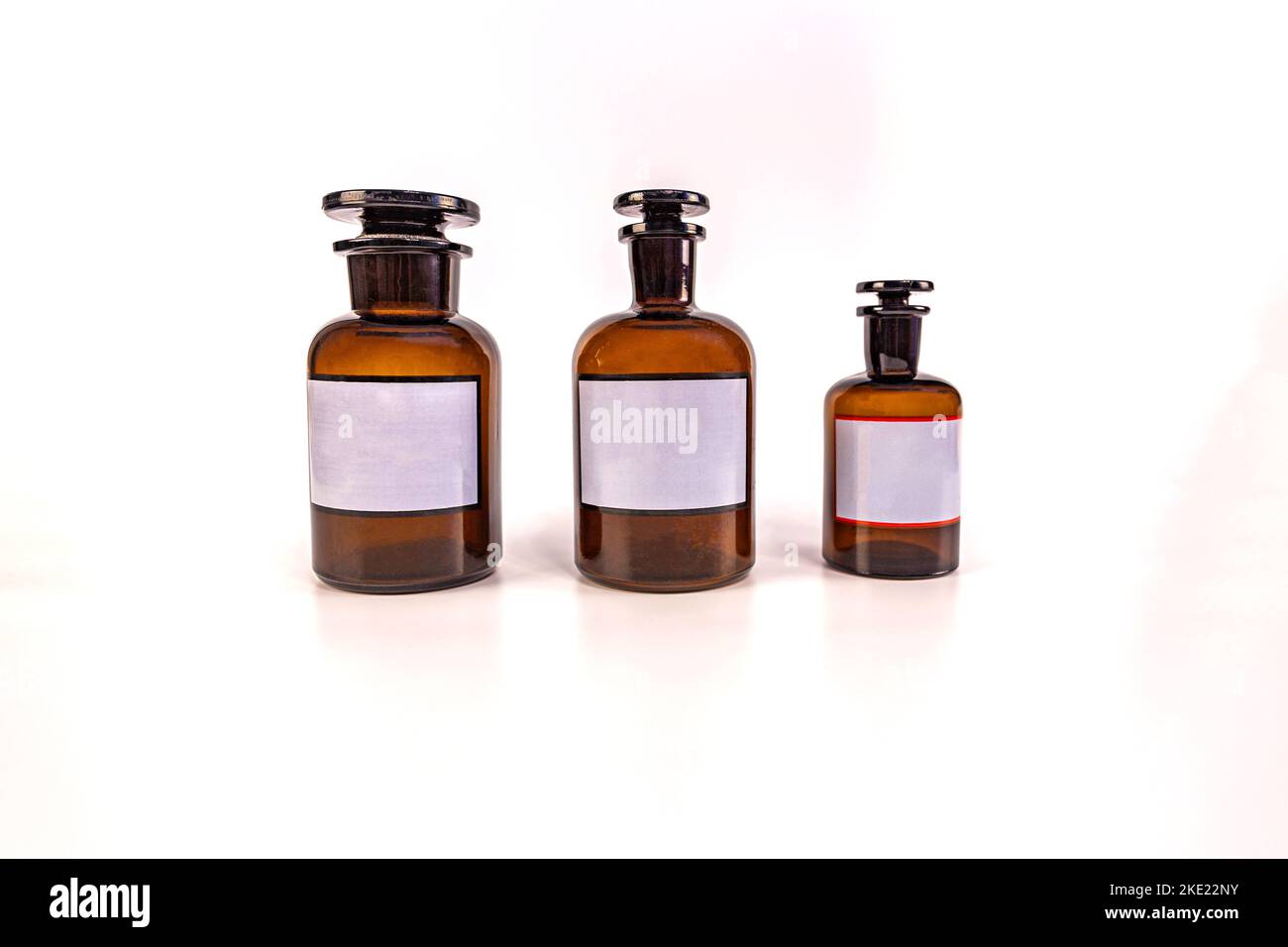 Three medical jars with glass stoppers on a white background Stock ...