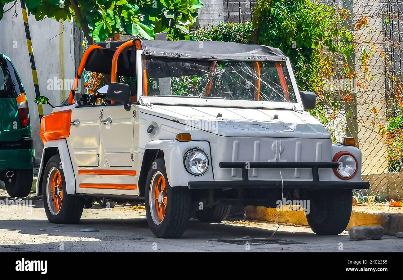 Various colorful tuned cars and classic vintage cars in Puerto ...