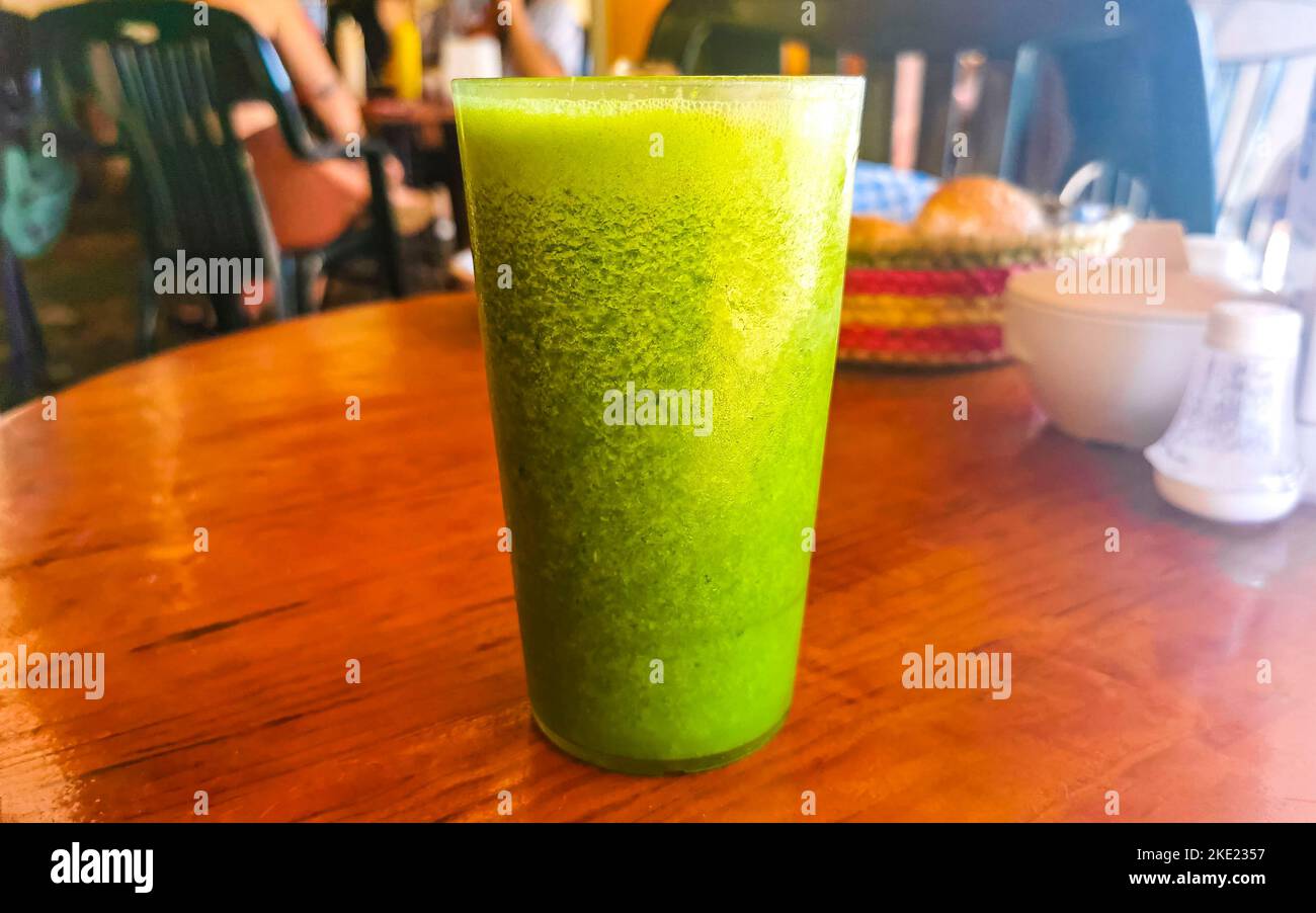 Green healthy juice smoothie in jar in El Cafecito in Zicatela Puerto ...
