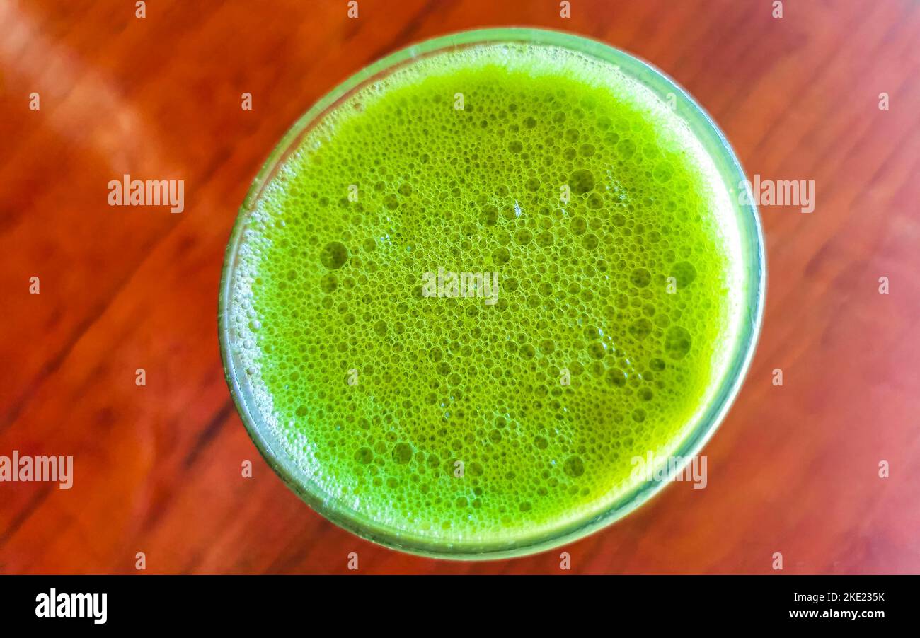 Green healthy juice smoothie in jar in El Cafecito in Zicatela Puerto ...