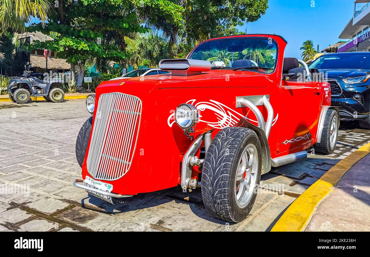 Various colorful tuned cars and classic vintage cars in Puerto ...