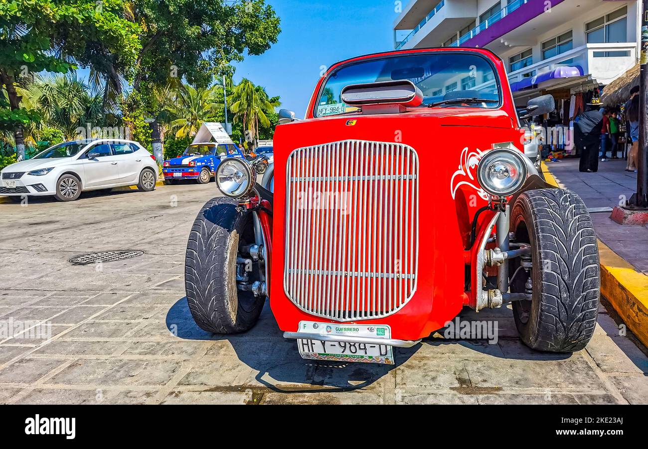 Various colorful tuned cars and classic vintage cars in Puerto ...