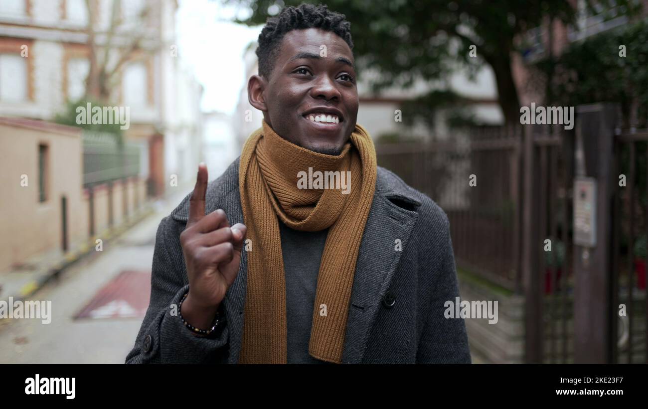 Black man celebrating success raising fist in the air. Successful ...