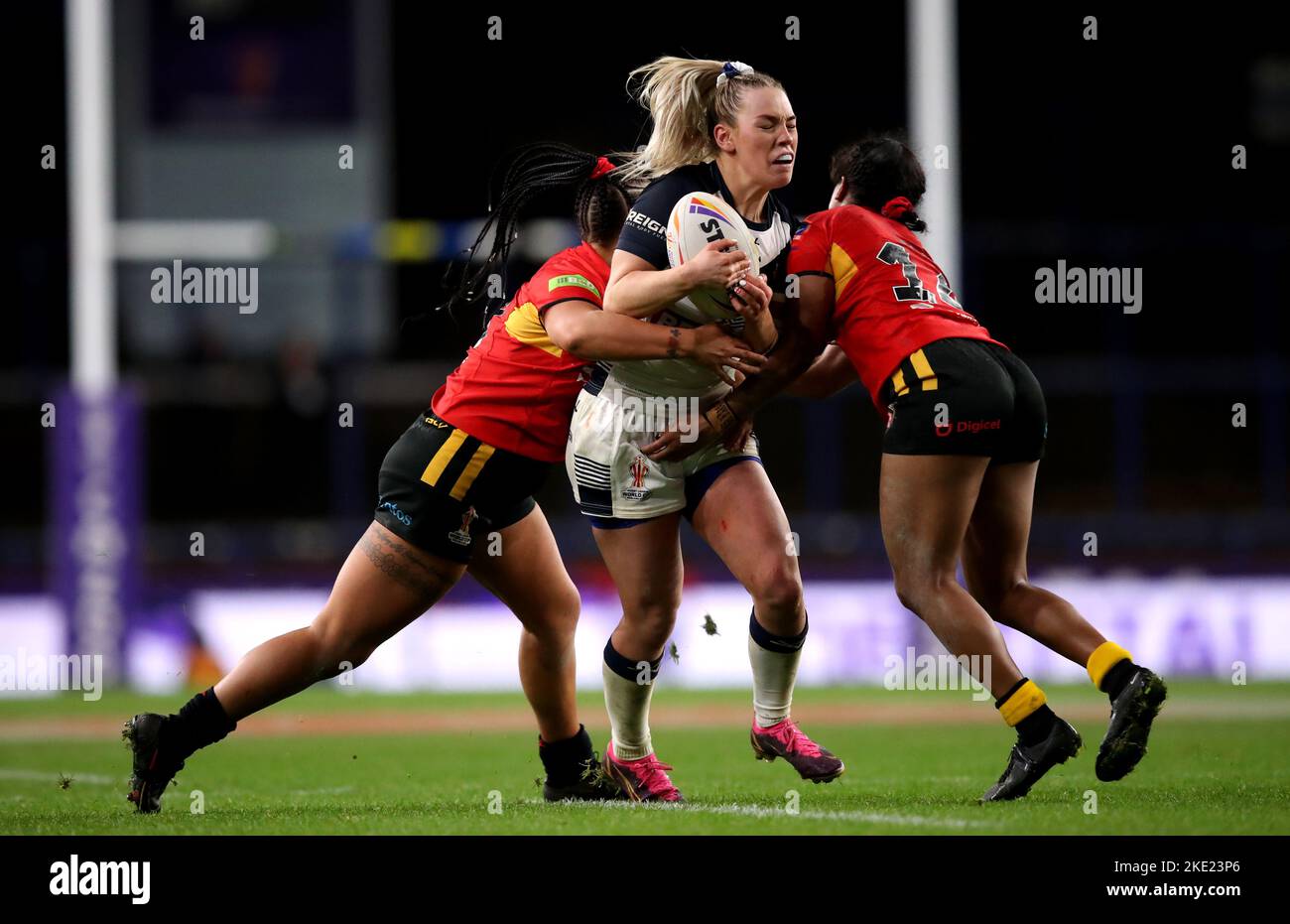 England's Hollie Dodd is tackled during the Women's Rugby League World ...