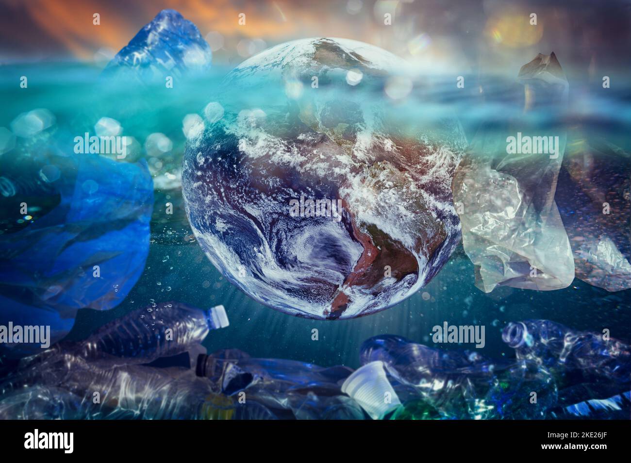 The world floats in the ocean amidst the plastic. Earh provided by NASA ...