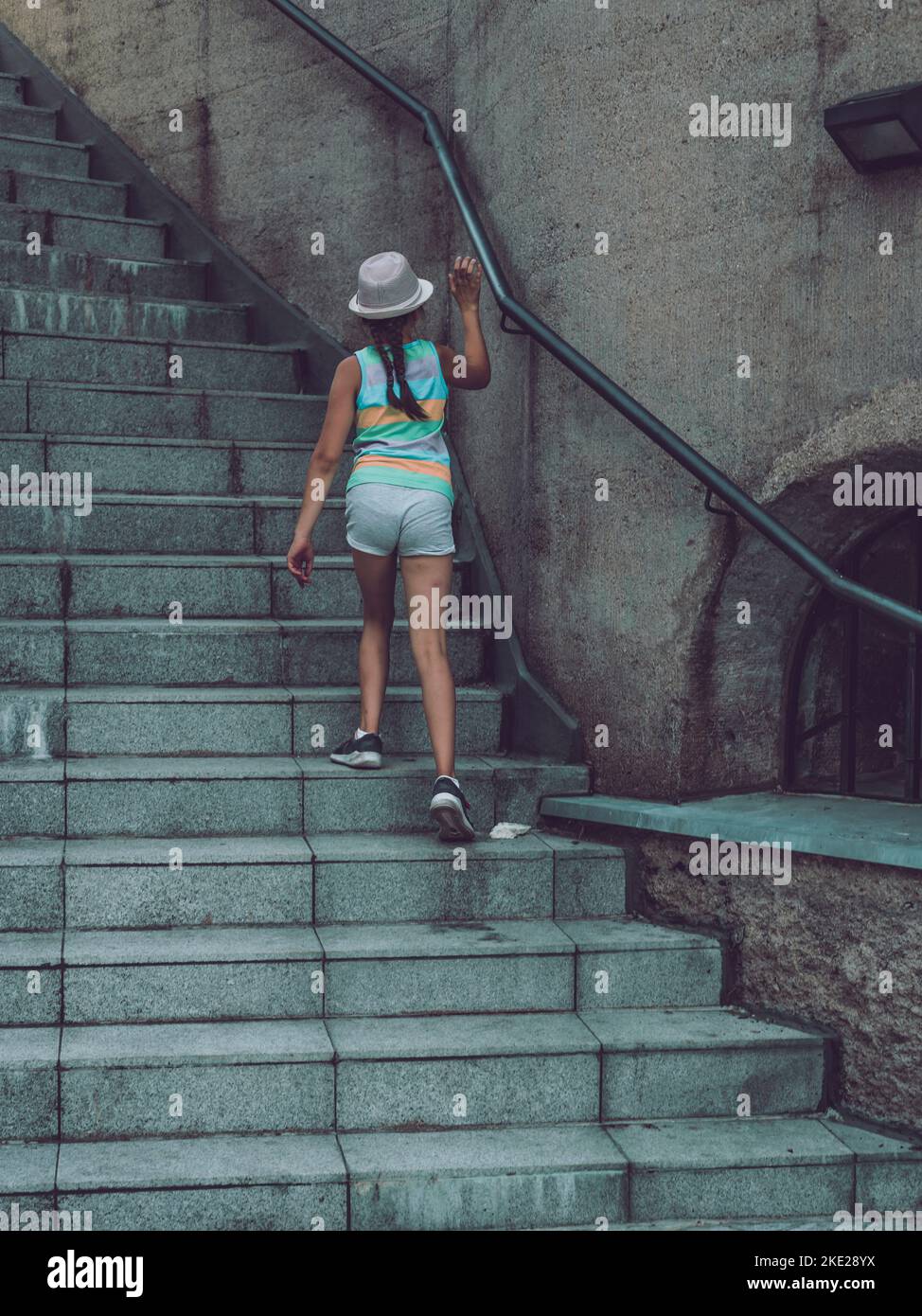 Girl stairs rear view hi-res stock photography and images - Alamy