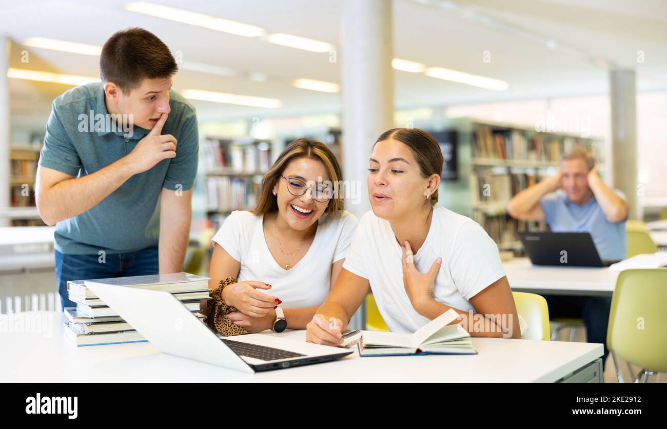 Student librarian talking hi-res stock photography and images - Alamy