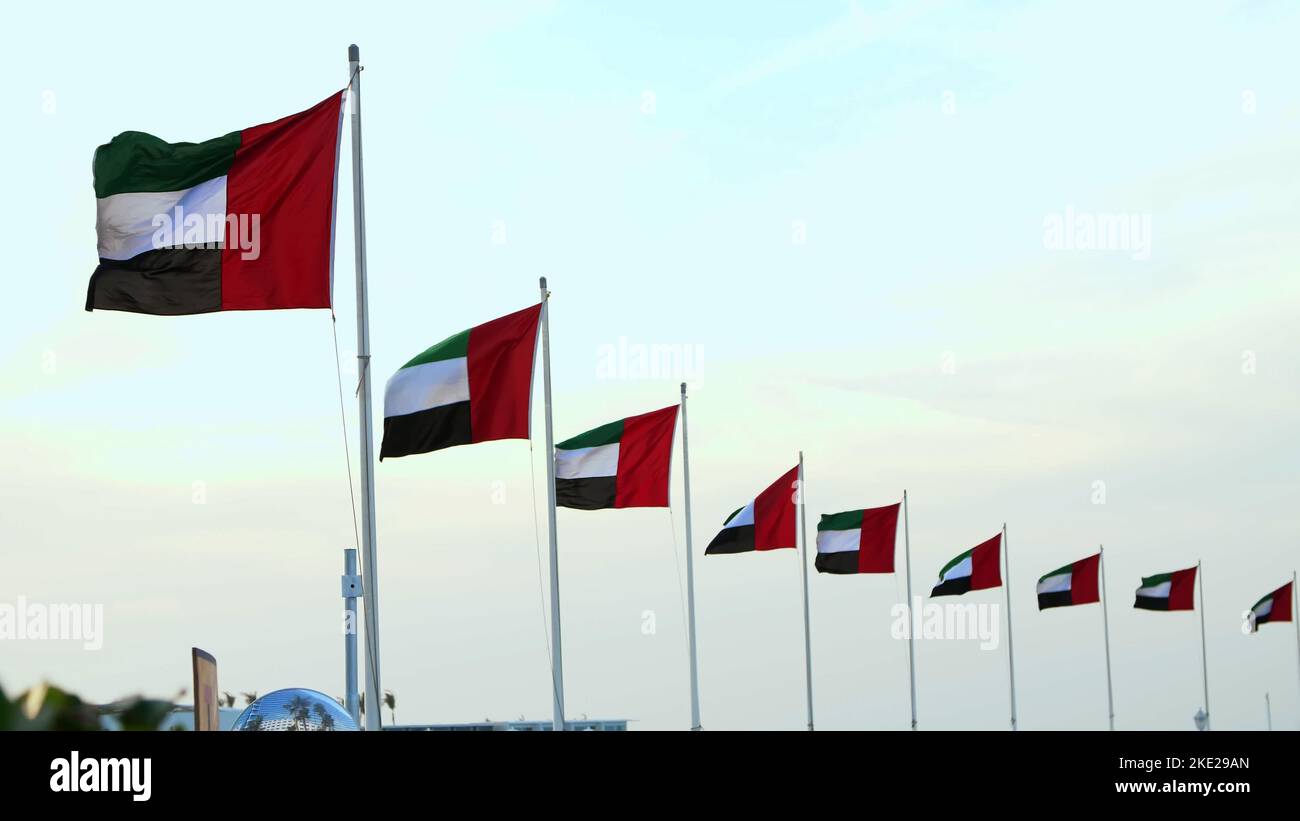 flags of UAE blowing in the wind. High quality photo Stock Photo - Alamy