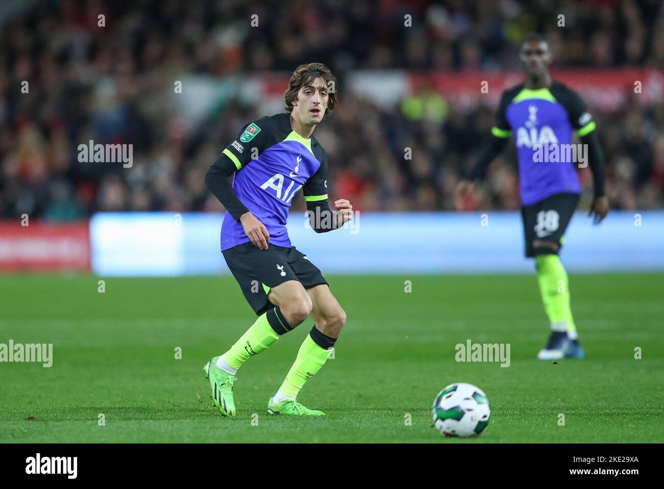 Bryan Gil #11 of Tottenham Hotspur passes the ball during the Carabao ...