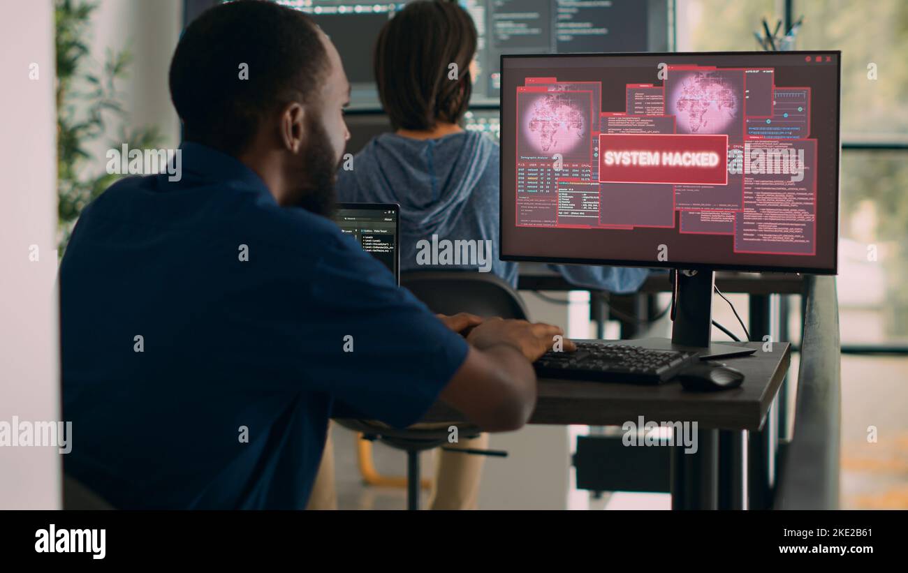 African American It Engineer Writing Code Encountering Hacking Alert On