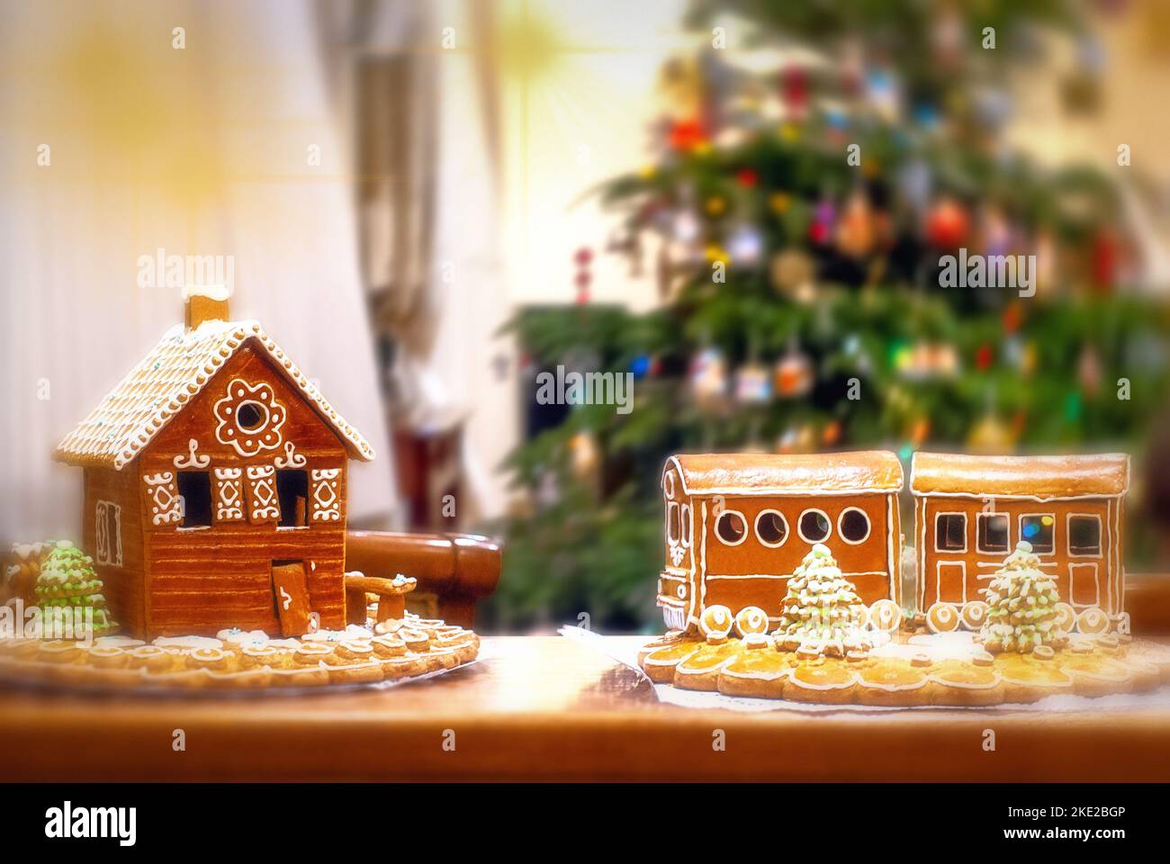 Gingerbread House, Christmas Treats on a Fir Tree Stock Photo - Alamy