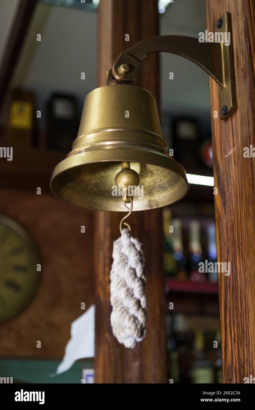 Retro old Rynda ship's bronze. On the bracket with tongue and rope ...