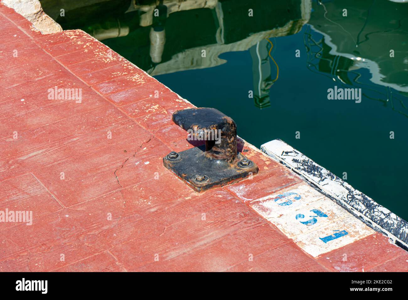 Mooring bollard in the port Stock Photo - Alamy