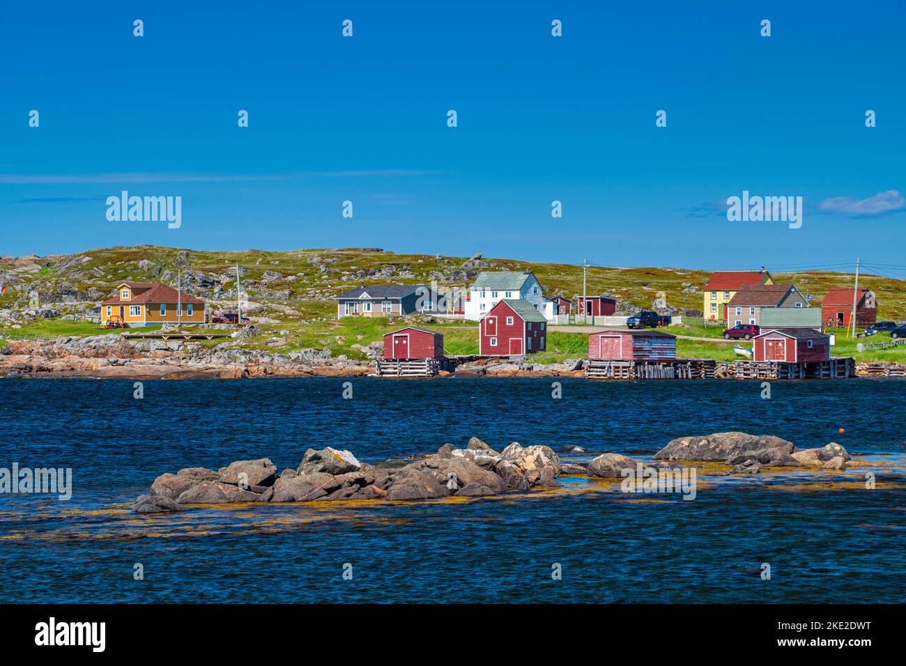 Houses and stages overlooking the harbour, Tilting, Newfoundland and ...