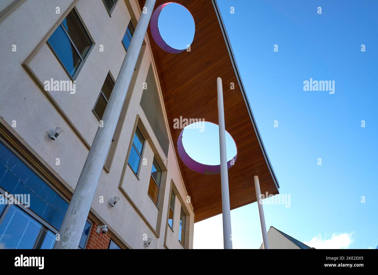 Looking up at a modern architecture building in Mansfield ...