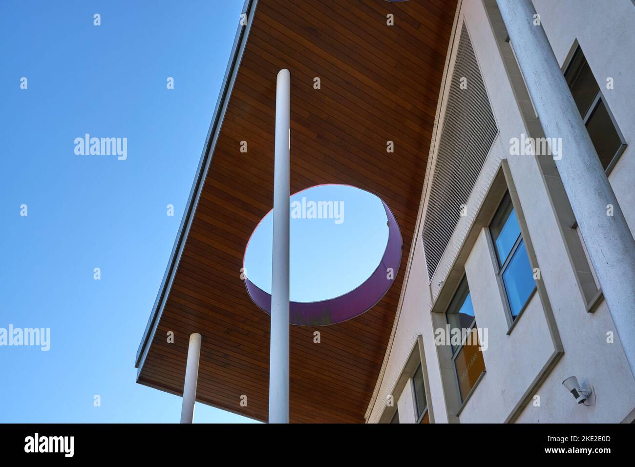 Looking up at a modern architecture building in Mansfield ...
