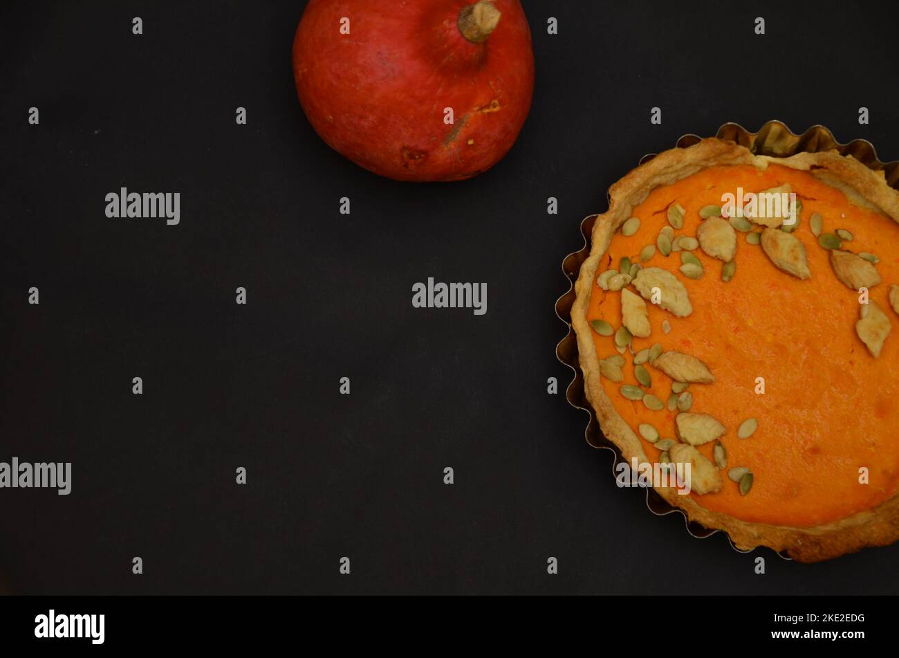 Fresh Homemade Pumpkin Pie made for Thanksgiving. on a black background ...