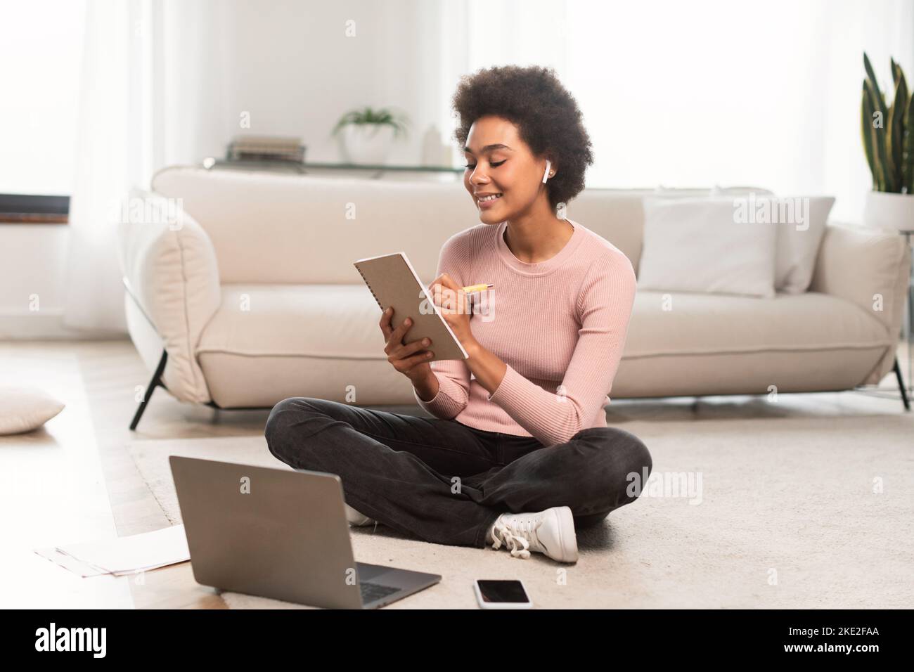 Glad Busy Millennial African American Female With Wireless Headphones