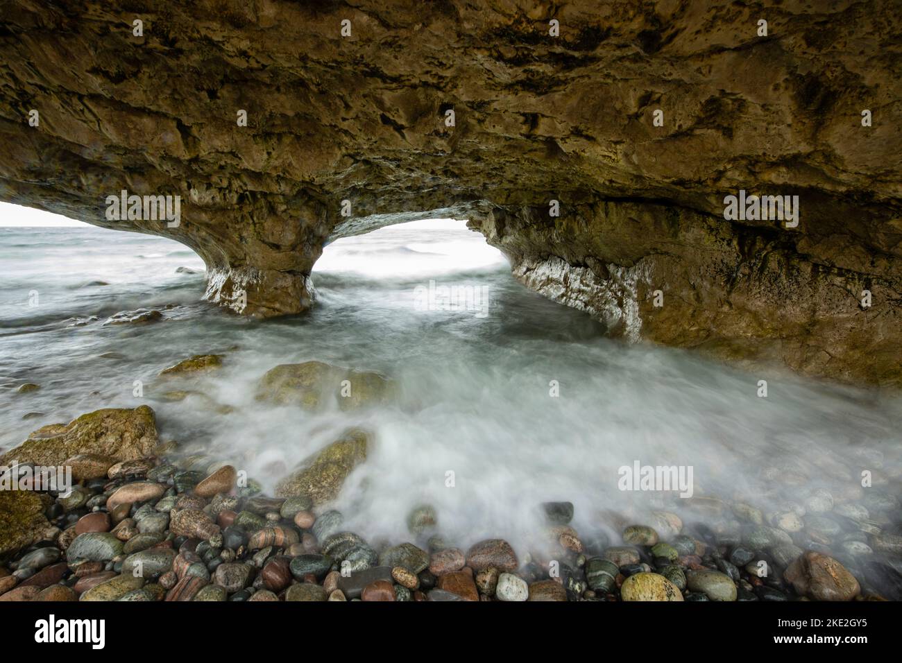 Surf and rocks under the Arches, Arches Provincial Park, Newfoundland ...