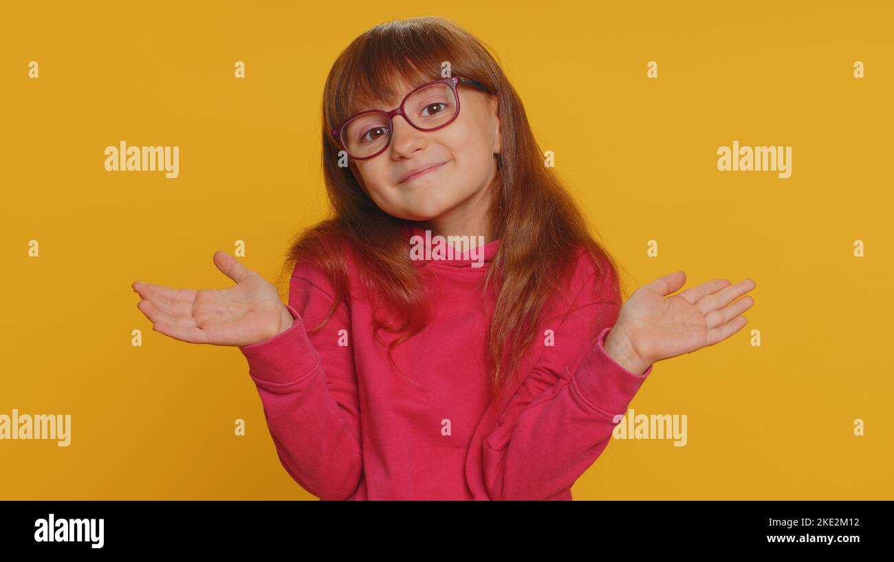 I dont know what to say. Confused young toddler school girl feeling ...