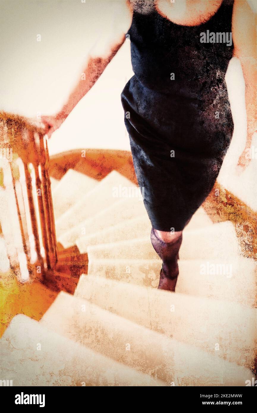 Woman ascending stairs hi-res stock photography and images - Alamy
