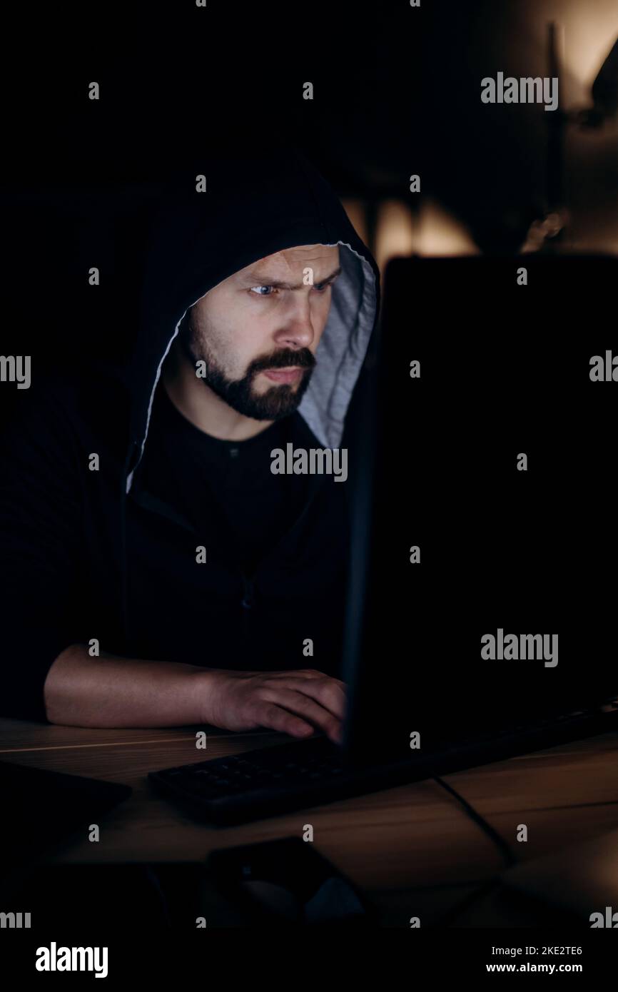 Man using pc for cyber crime Stock Photo - Alamy