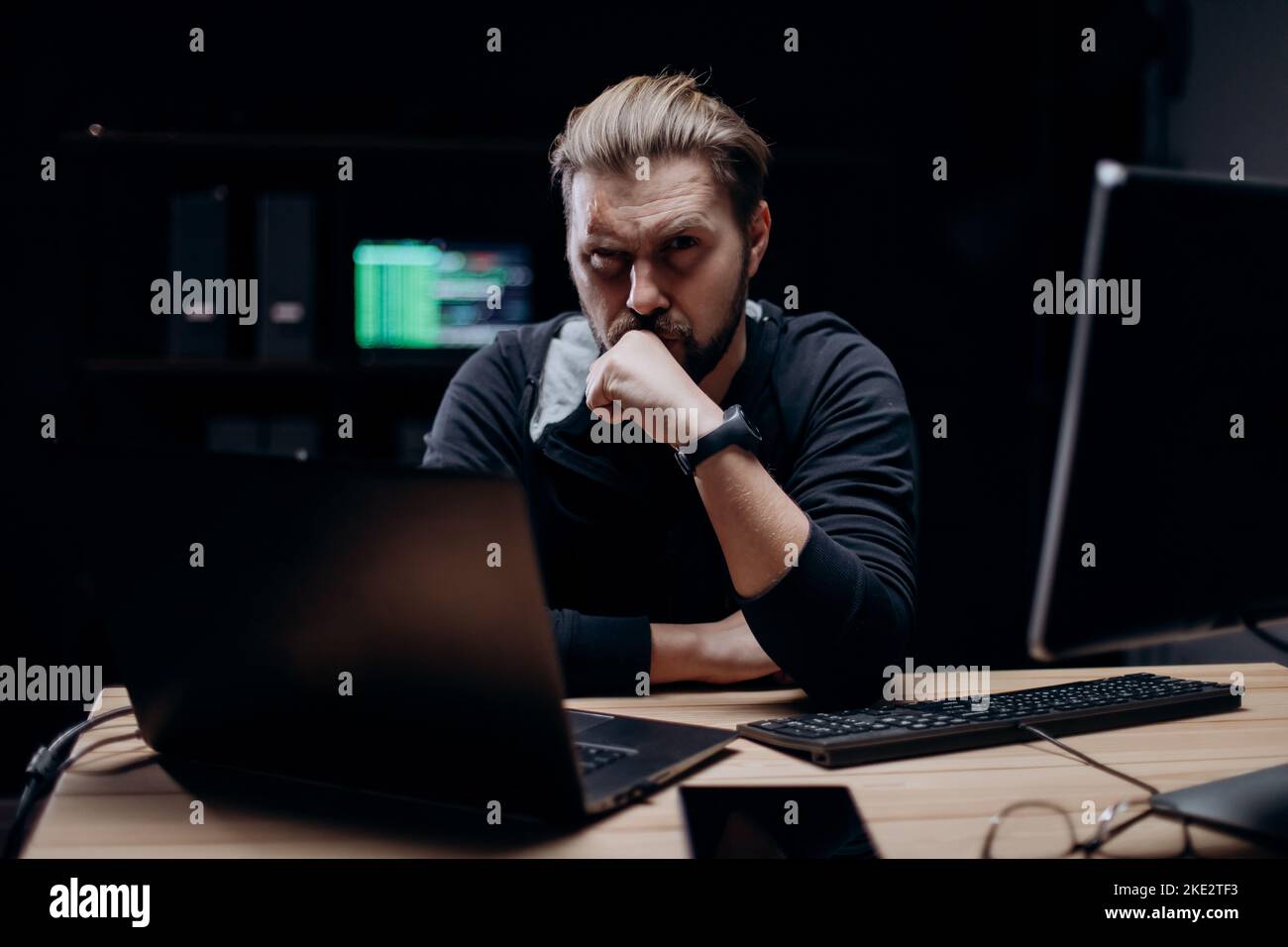 Computer hacker at dark room Stock Photo - Alamy