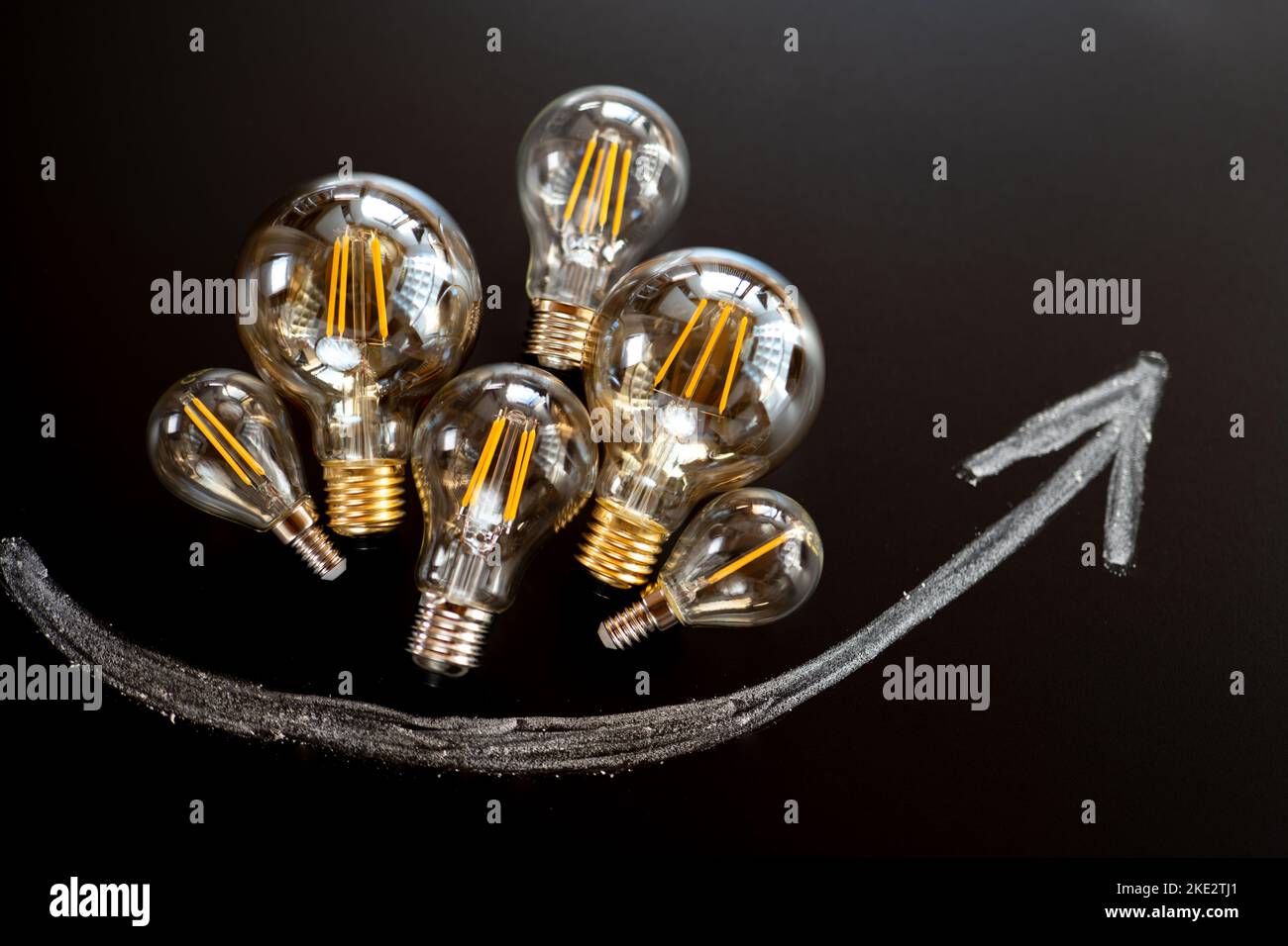 Electricity cost.Rising electricity prices.light bulbs energy saving ...