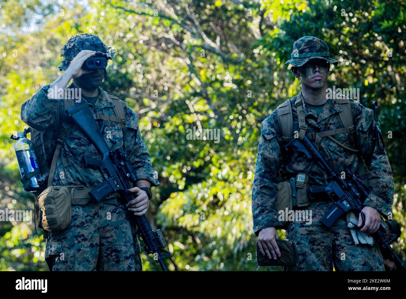 U.S. Marine 2nd Lt. James A. Anders III ,right, a combat engineer ...