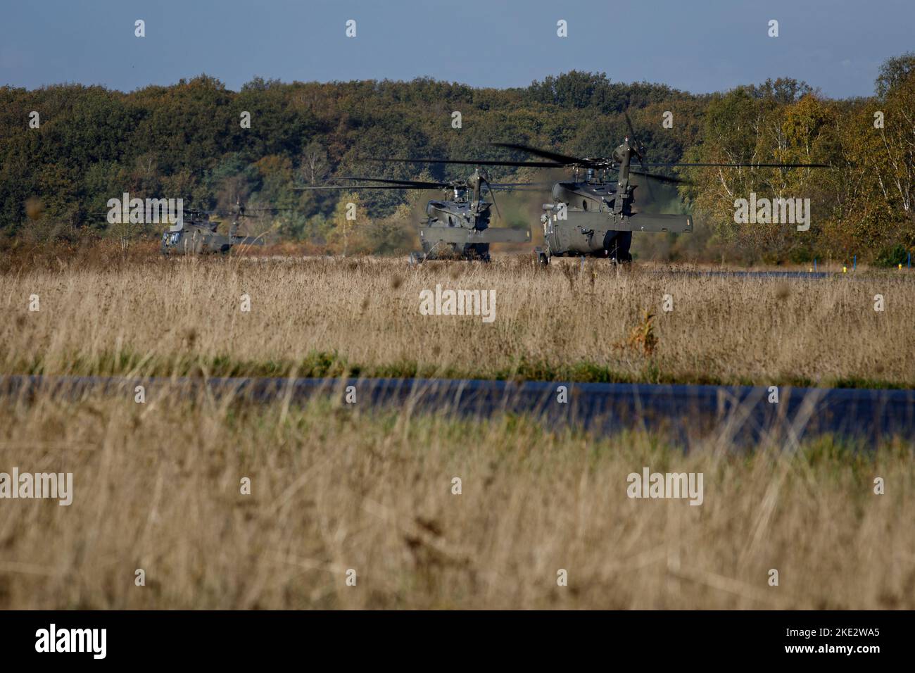 Three U.S. Army UH-60 Black Hawk helicopters from the 1st Battalion ...