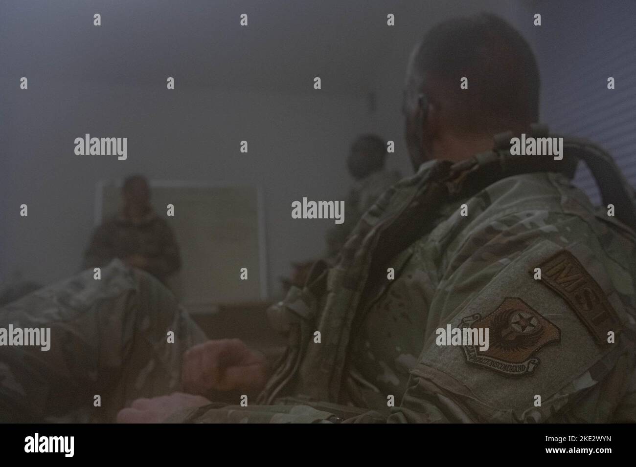 Members of the 137th Mission Sustainment Team conduct a brief after ...