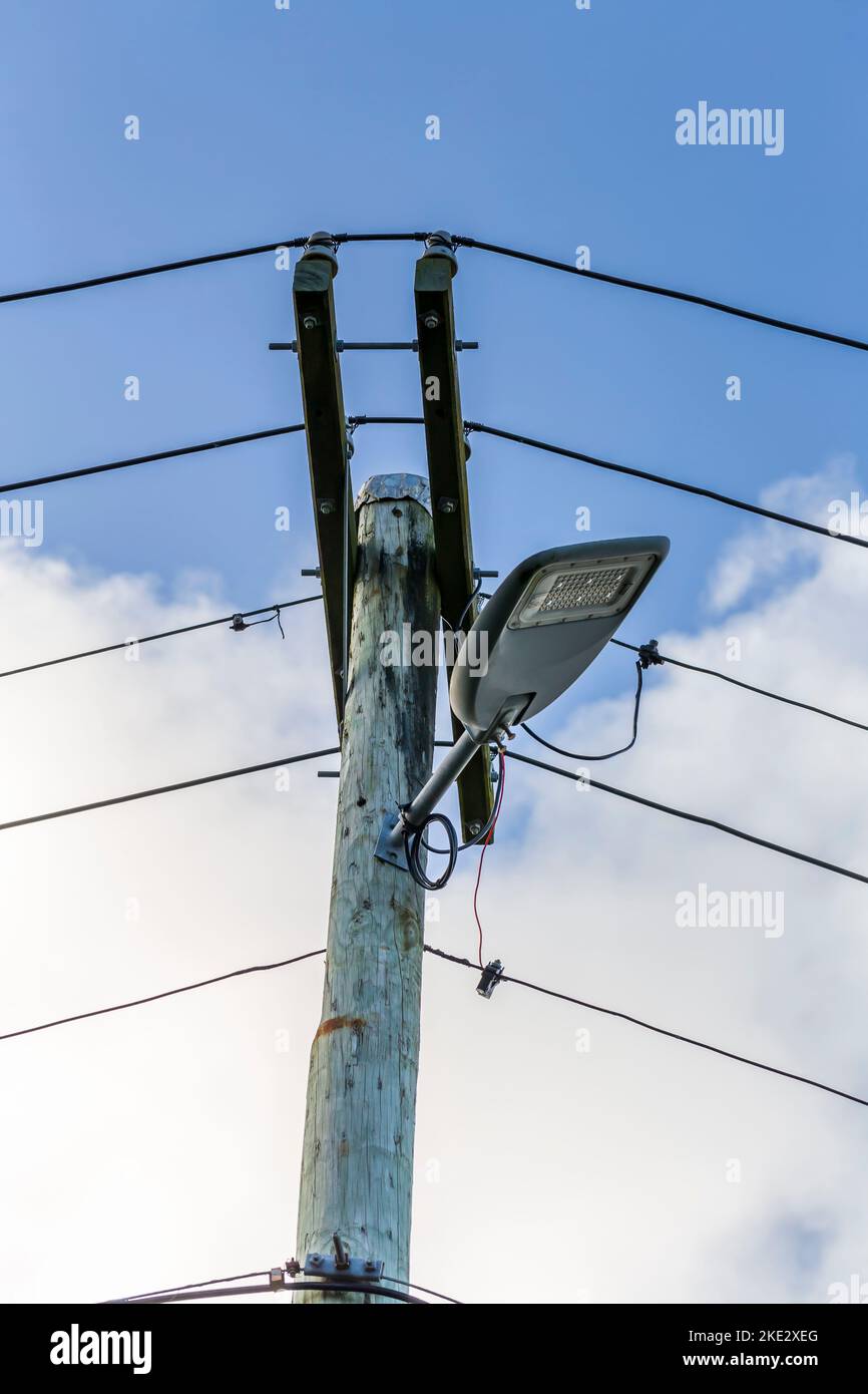 Low angle view of electricity pylon against sky Stock Photo - Alamy