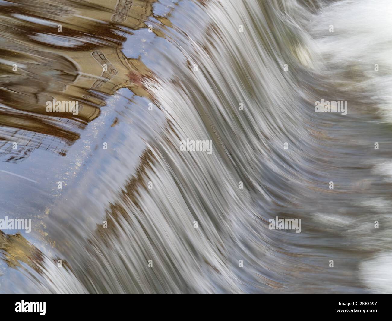 A small flat cascade in a calm river. Water background Stock Photo - Alamy