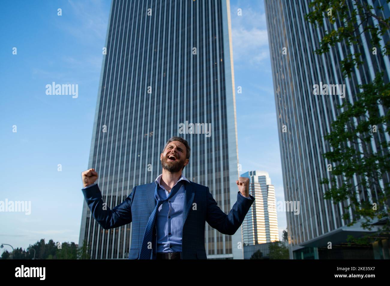 Overworked excited business man. Hard business work Stock Photo - Alamy