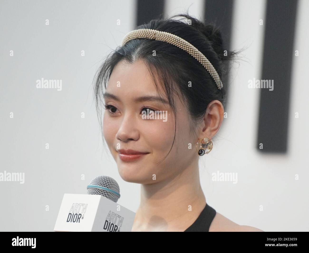 Chinese model Ming Xi attends the opening of ART’N DIOR in Shanghai ...