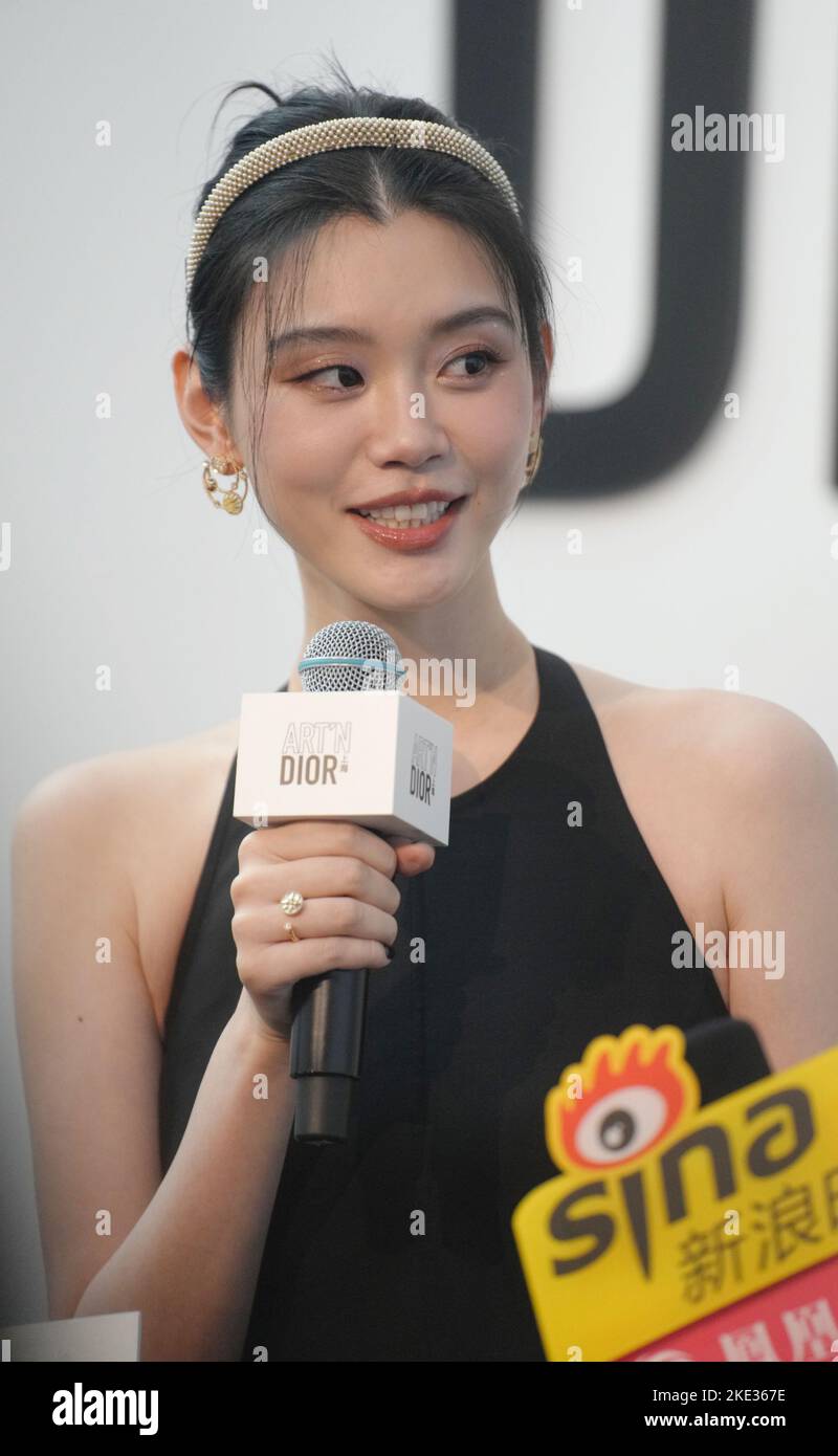 Chinese model Ming Xi attends the opening of ART’N DIOR in Shanghai ...