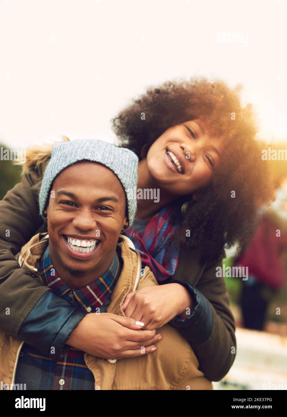 Feeling young and free. Portrait of a happy young couple enjoying the ...