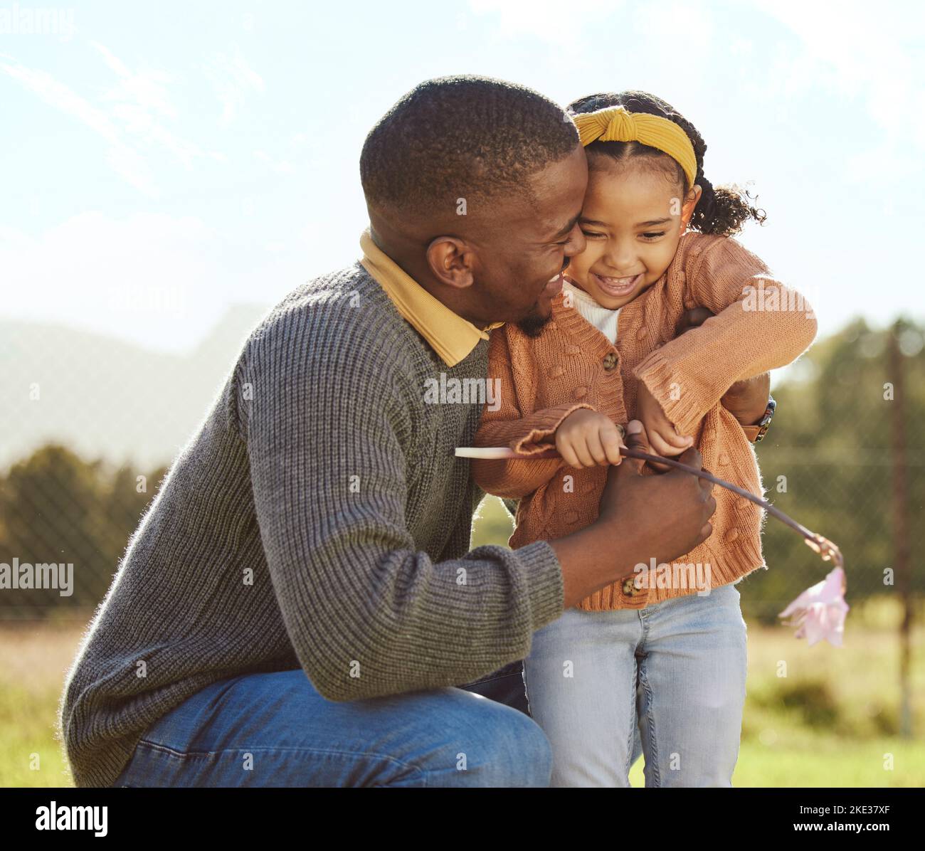 Black man hug girl kid in park, garden and grass field outdoors for ...
