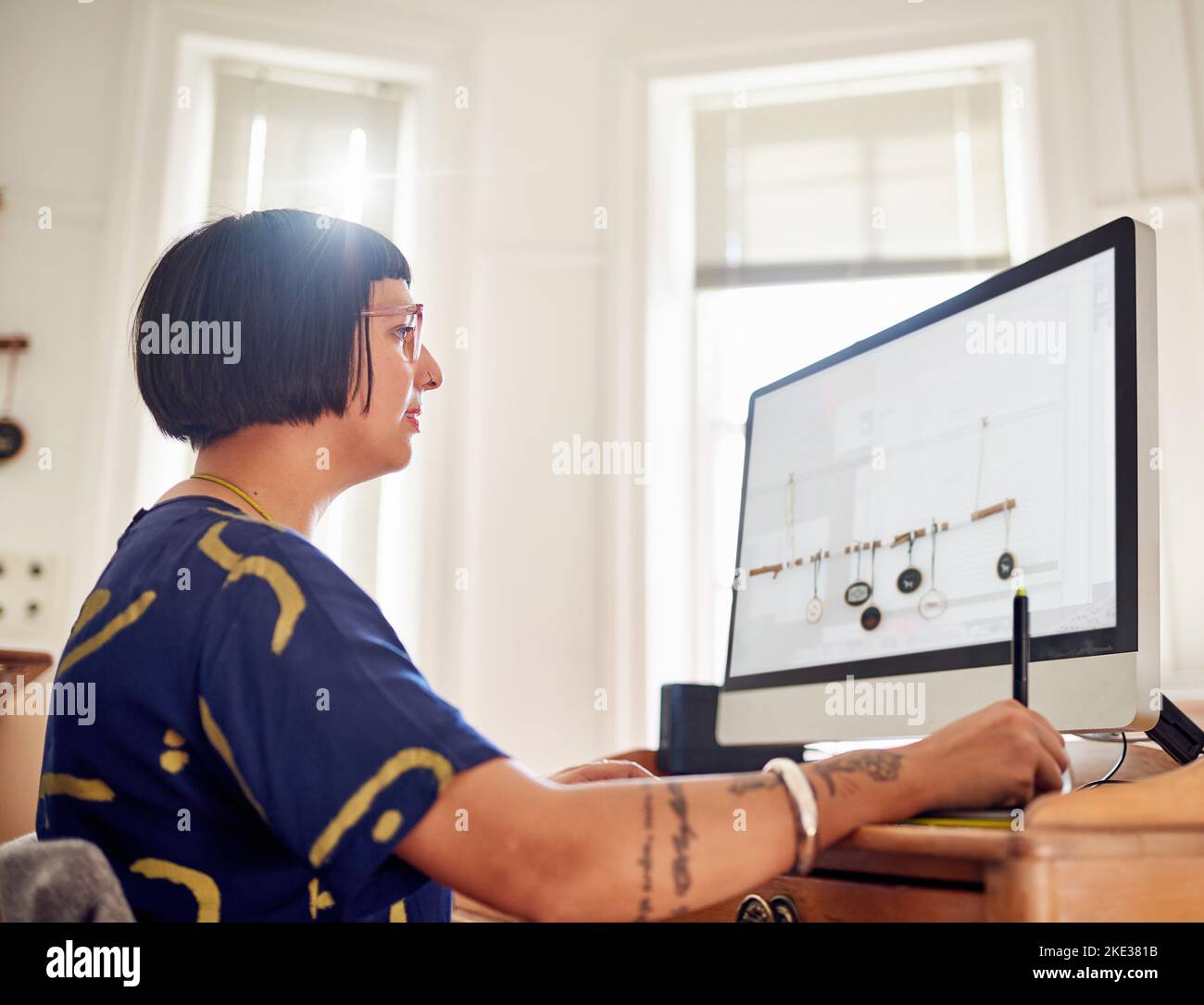 Design is her passion. a stylish young designer working on computer in ...