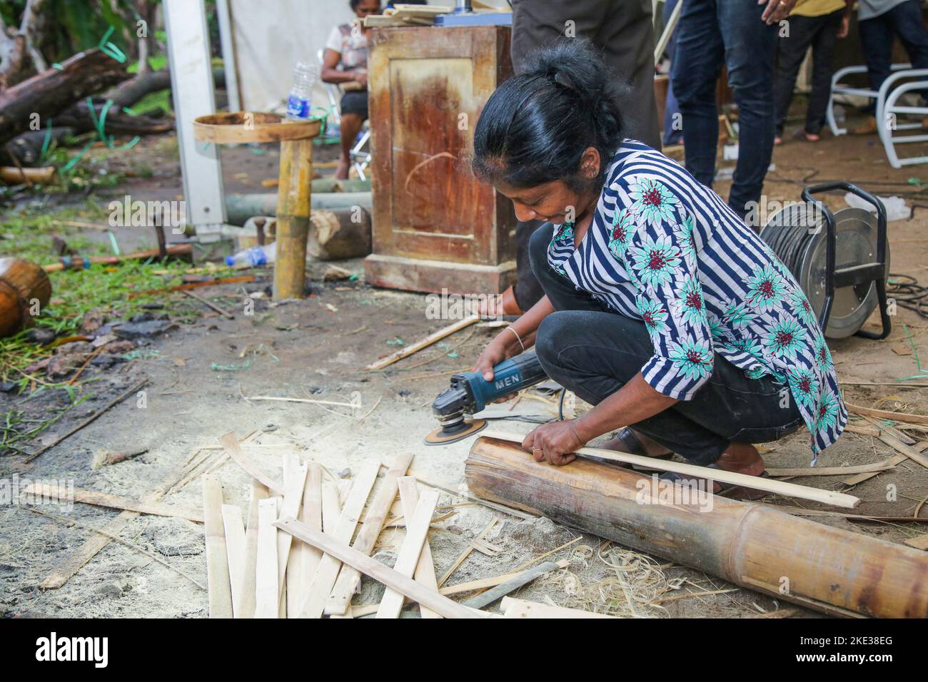 working women with wood cutting matching bamboo coting marching wooden ...