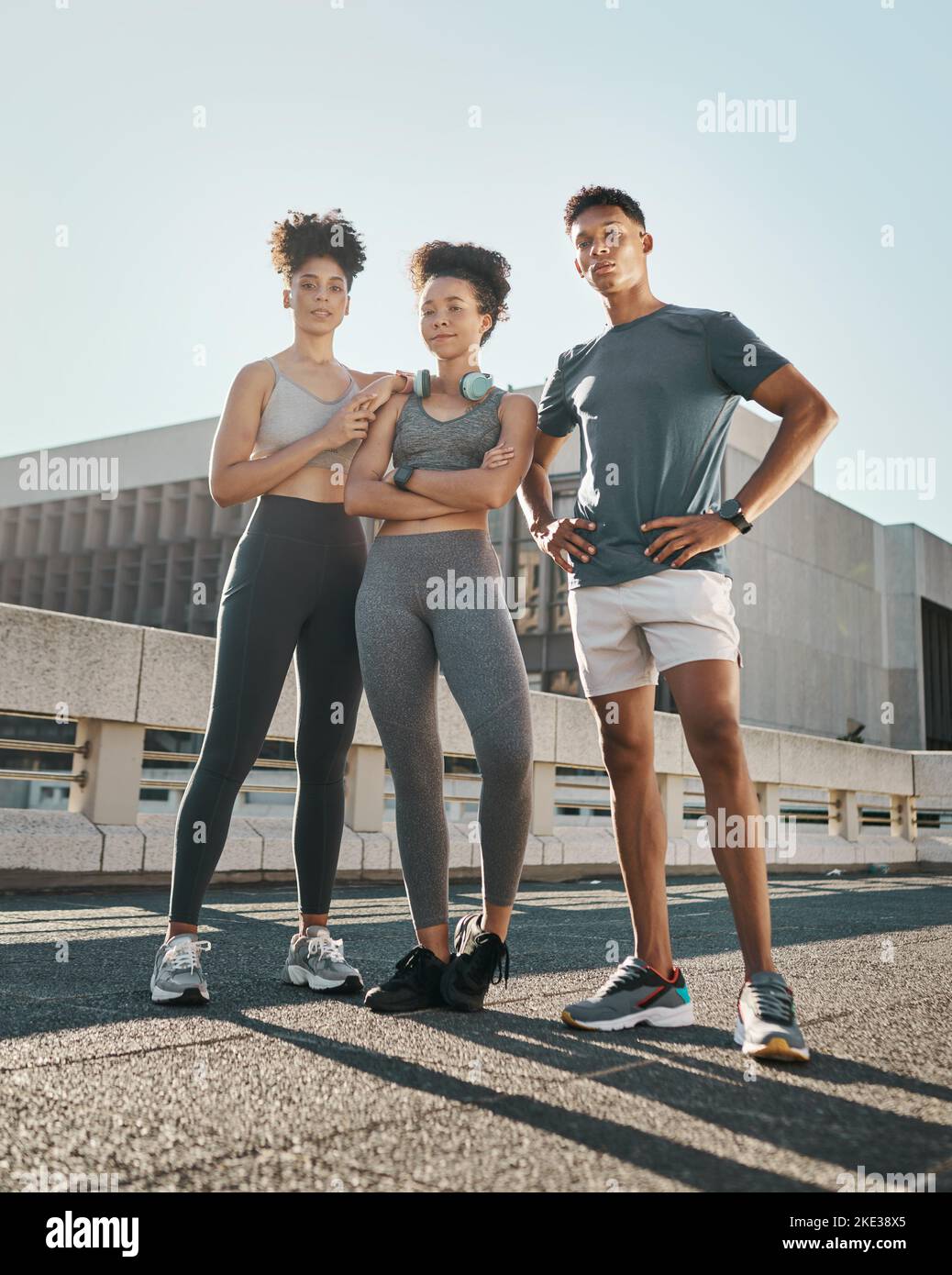 Fitness, portrait and happy fitness team on runners, teamwork and ...