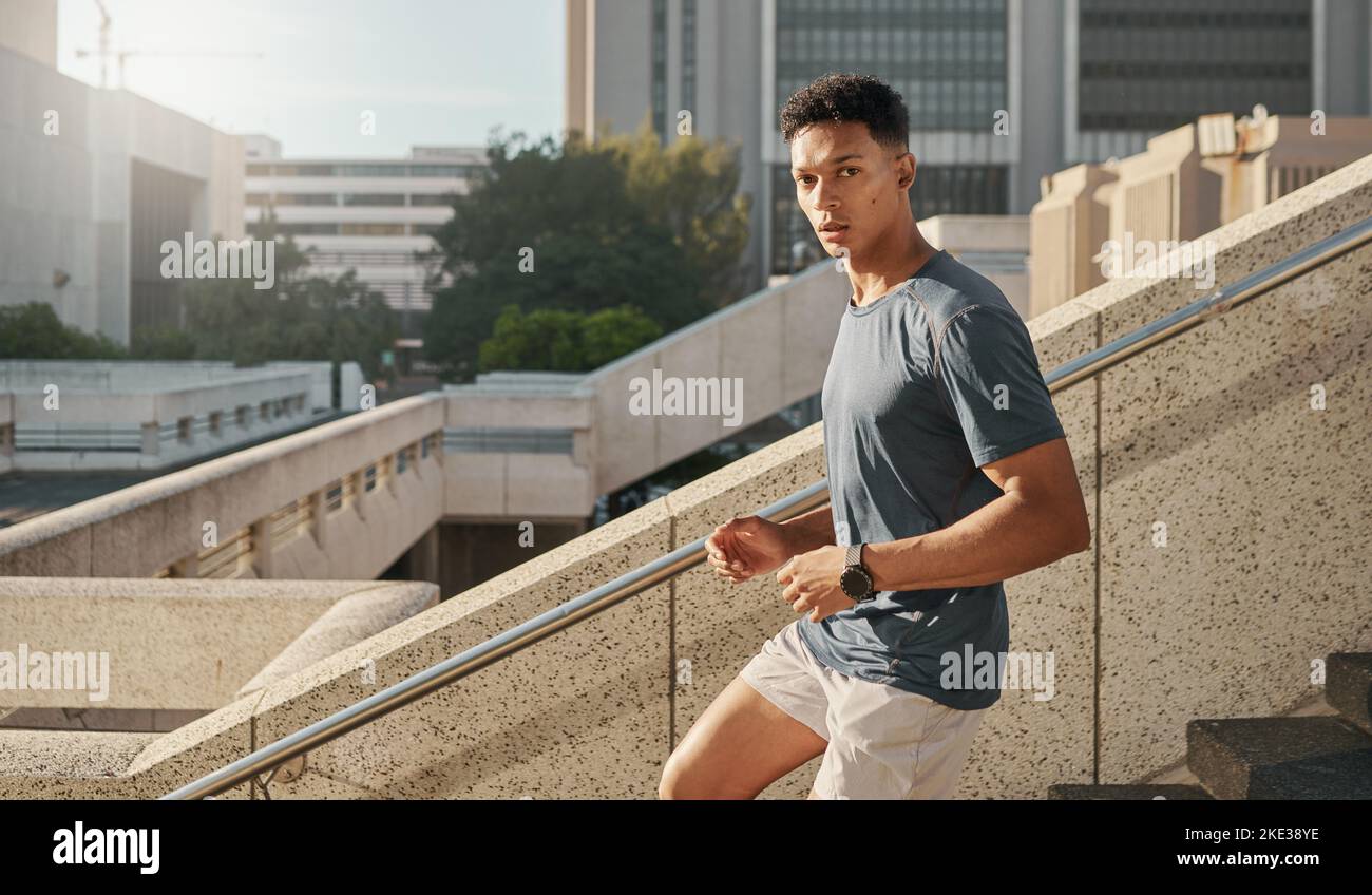 Man, running or city steps for fitness, heart health training or cardio ...