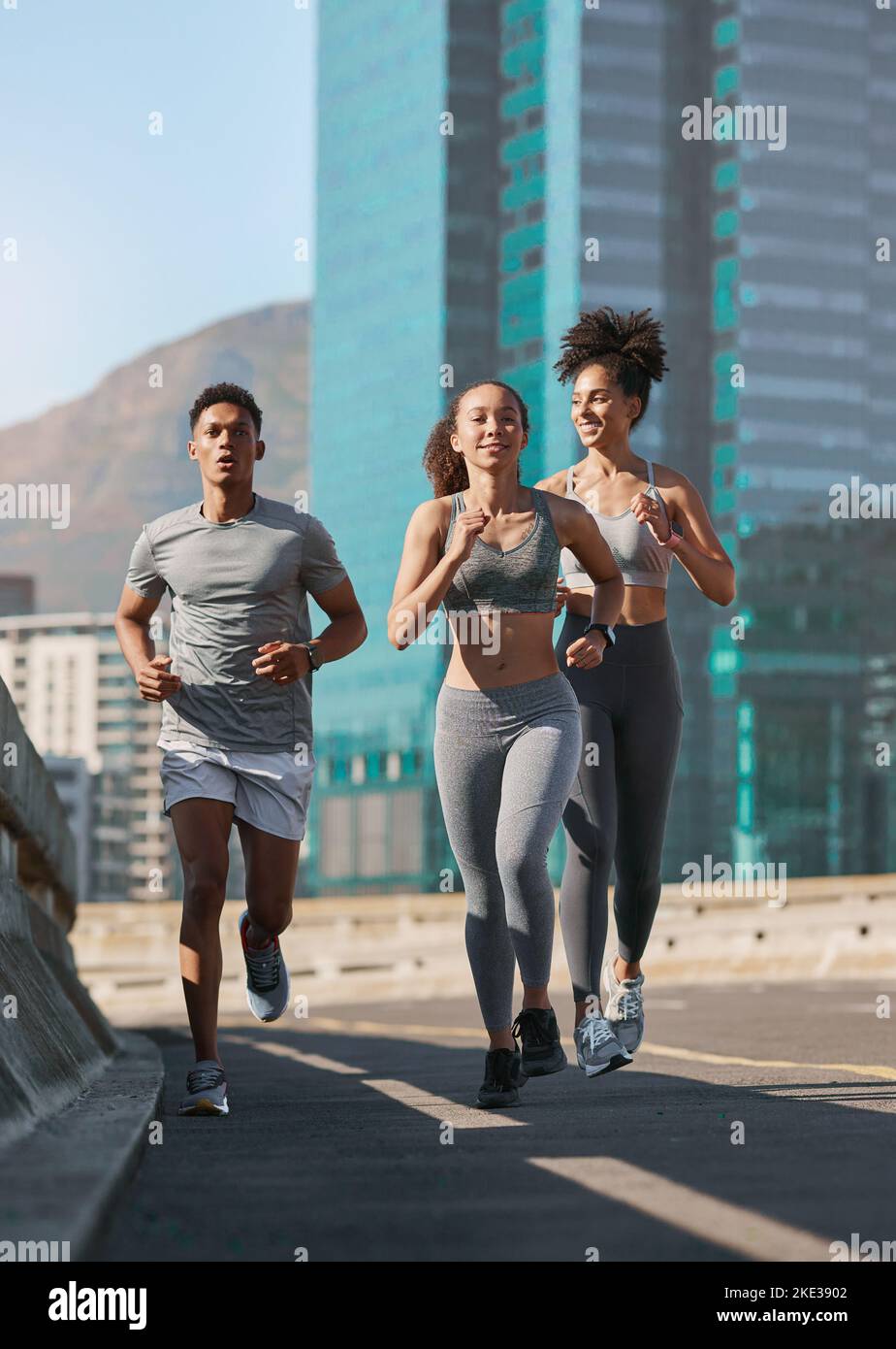 Diversity, fitness friends and running together in city for freedom or ...